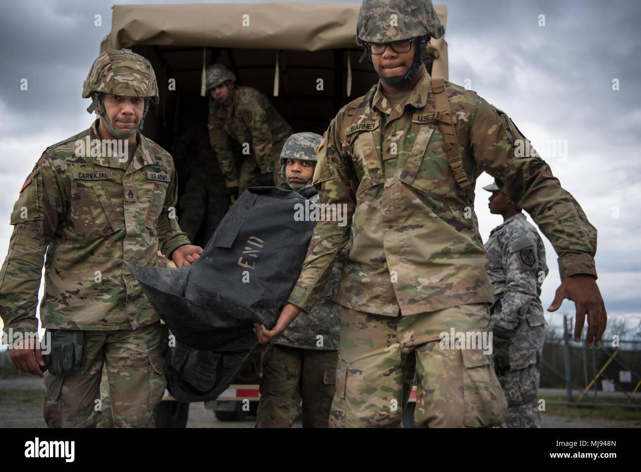 Staff Sgt. John Carvajal, a human resource sergeant, Sgt. Dagineaux ...