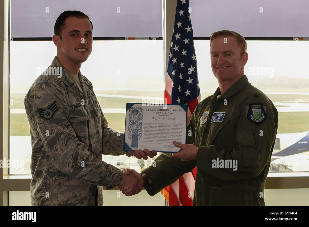 Lt. Col. Kit Conn, 436th Operations Support Squadron commander (right ...