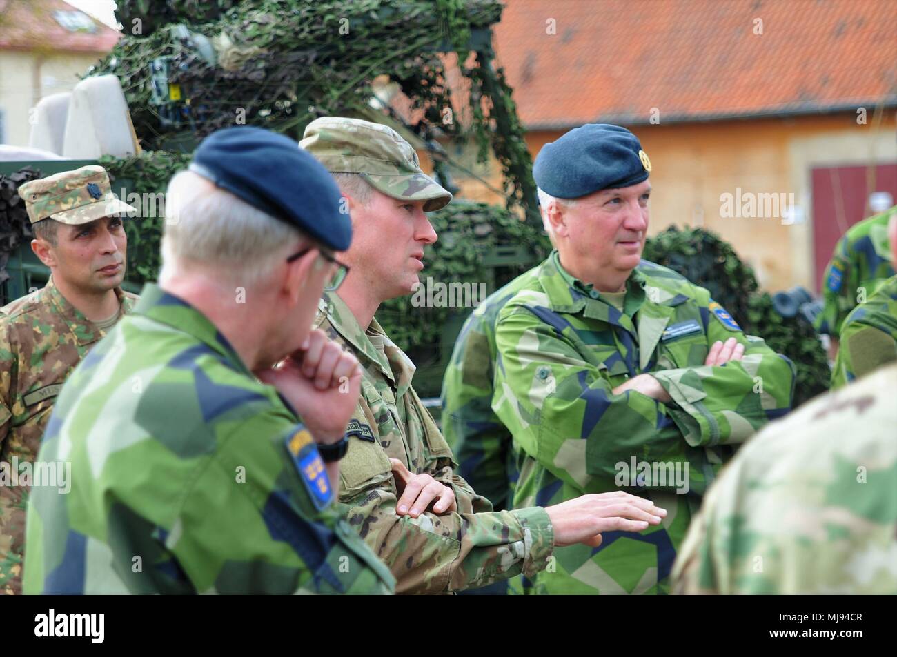 U.S. Army Lt. Col. Adam Lackey, Battle Group Poland commander, briefs ...