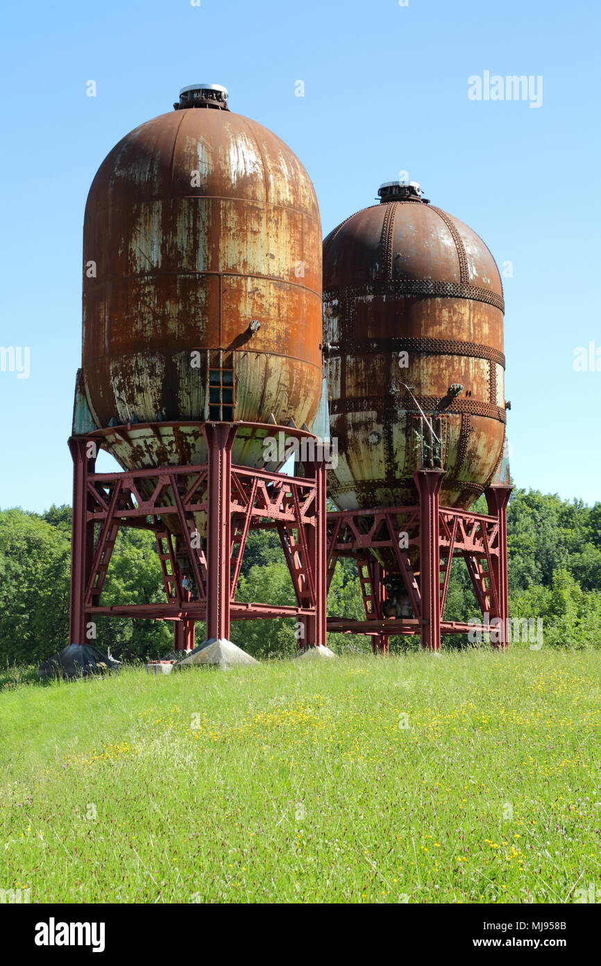 Old industrial architecture in Austria - rusty metal silo tanks Stock ...