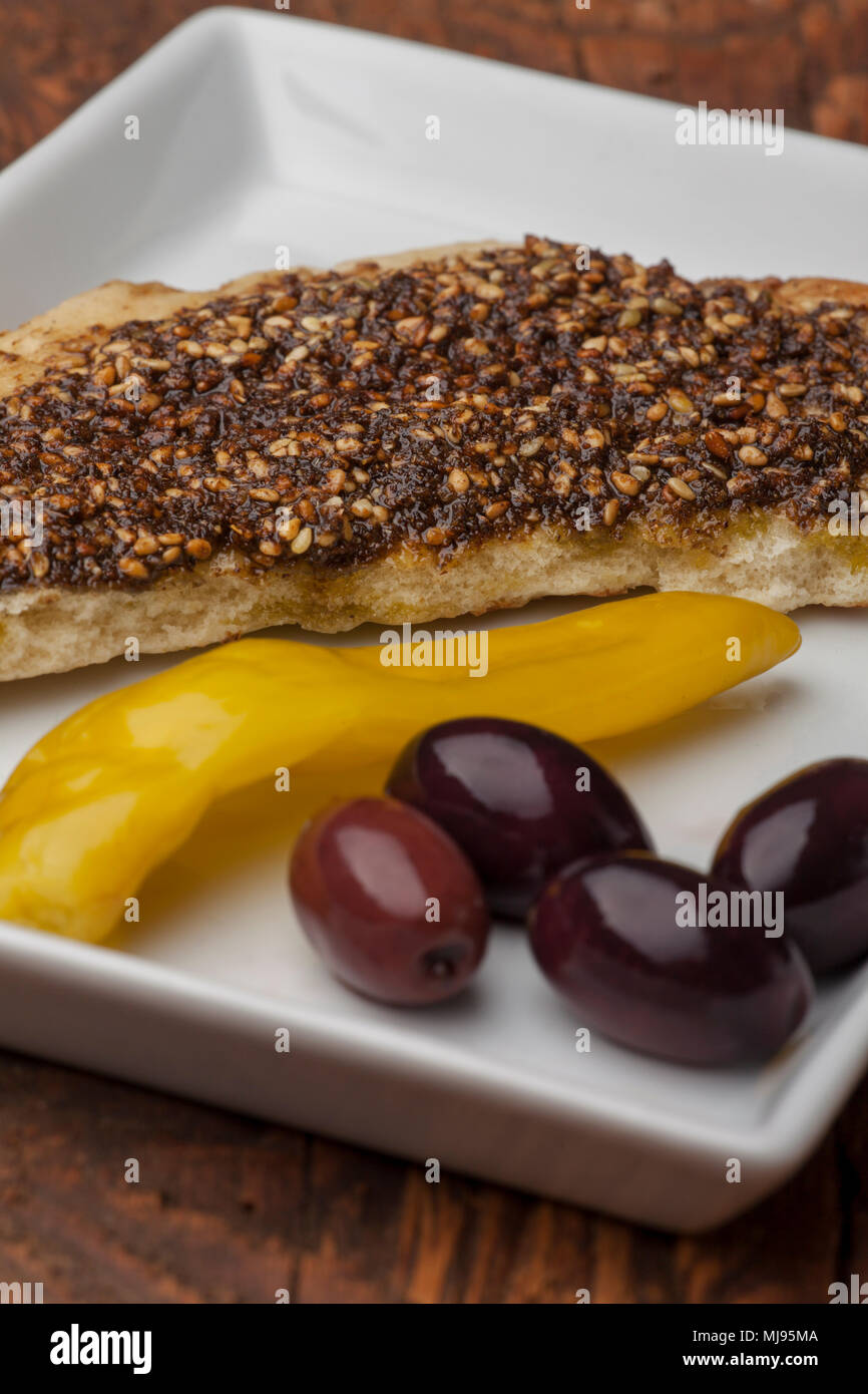 arabian bread with olive and pepper Stock Photo - Alamy