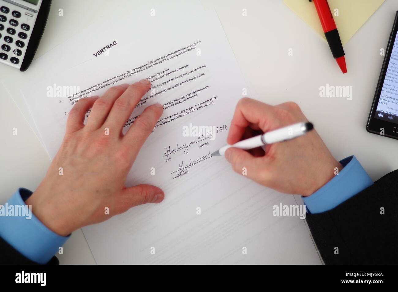 Closeup male hand signing contract hi-res stock photography and images ...