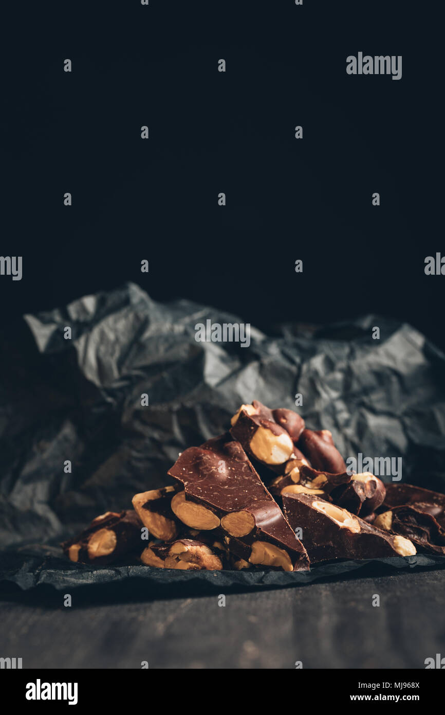Chocolate on crumpled paper Stock Photo - Alamy
