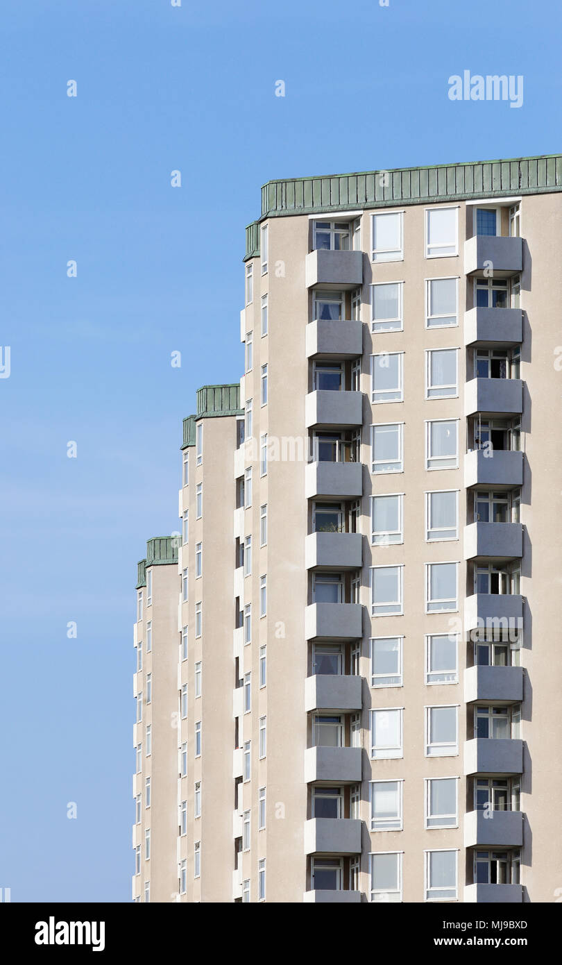 Three high-rise buildings againt a blue sky Stock Photo - Alamy