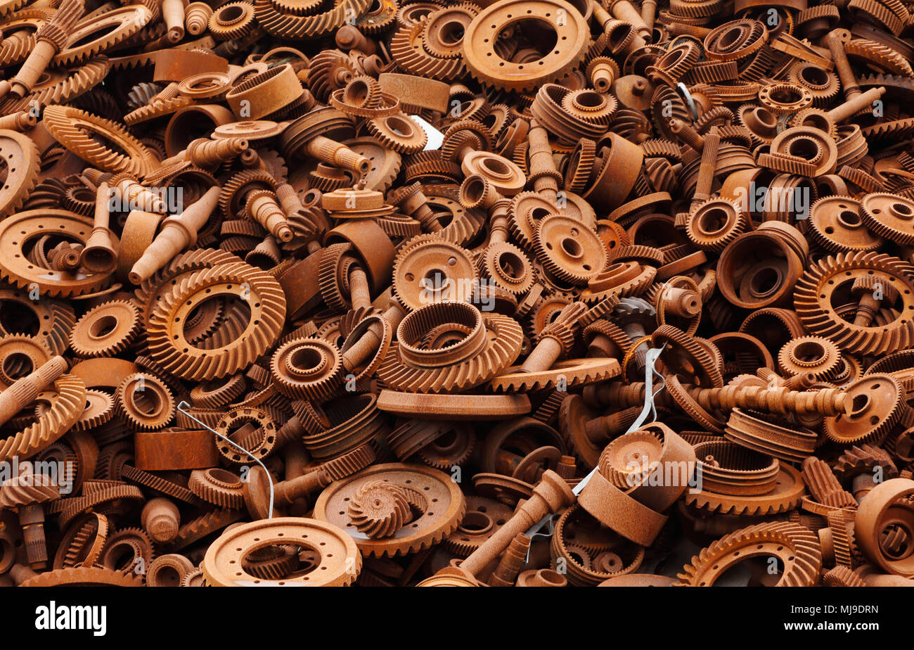 Junkyard with rusty machinery parts Stock Photo - Alamy