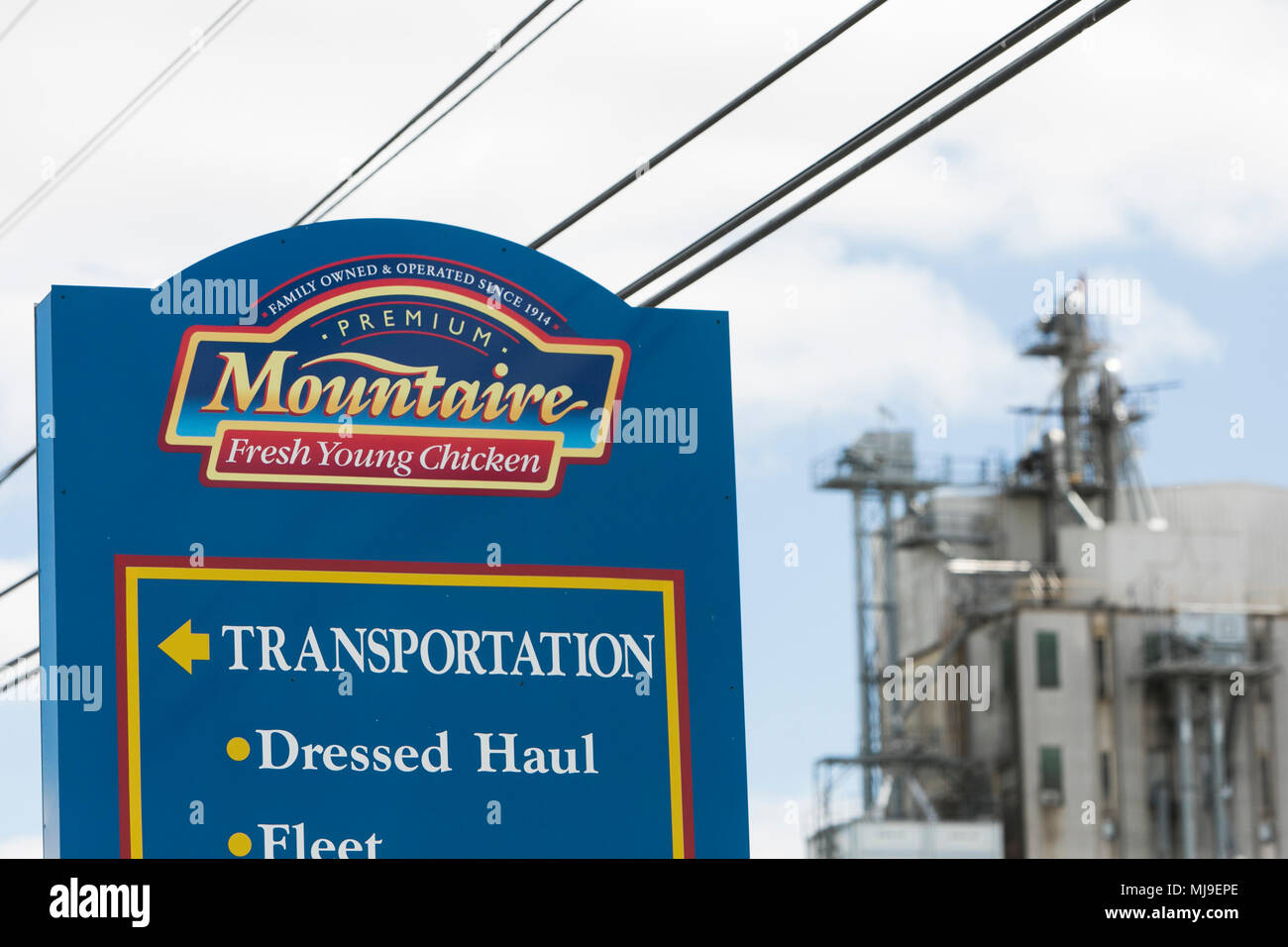 A logo sign outside of a facility occupied by Mountaire Farms in ...