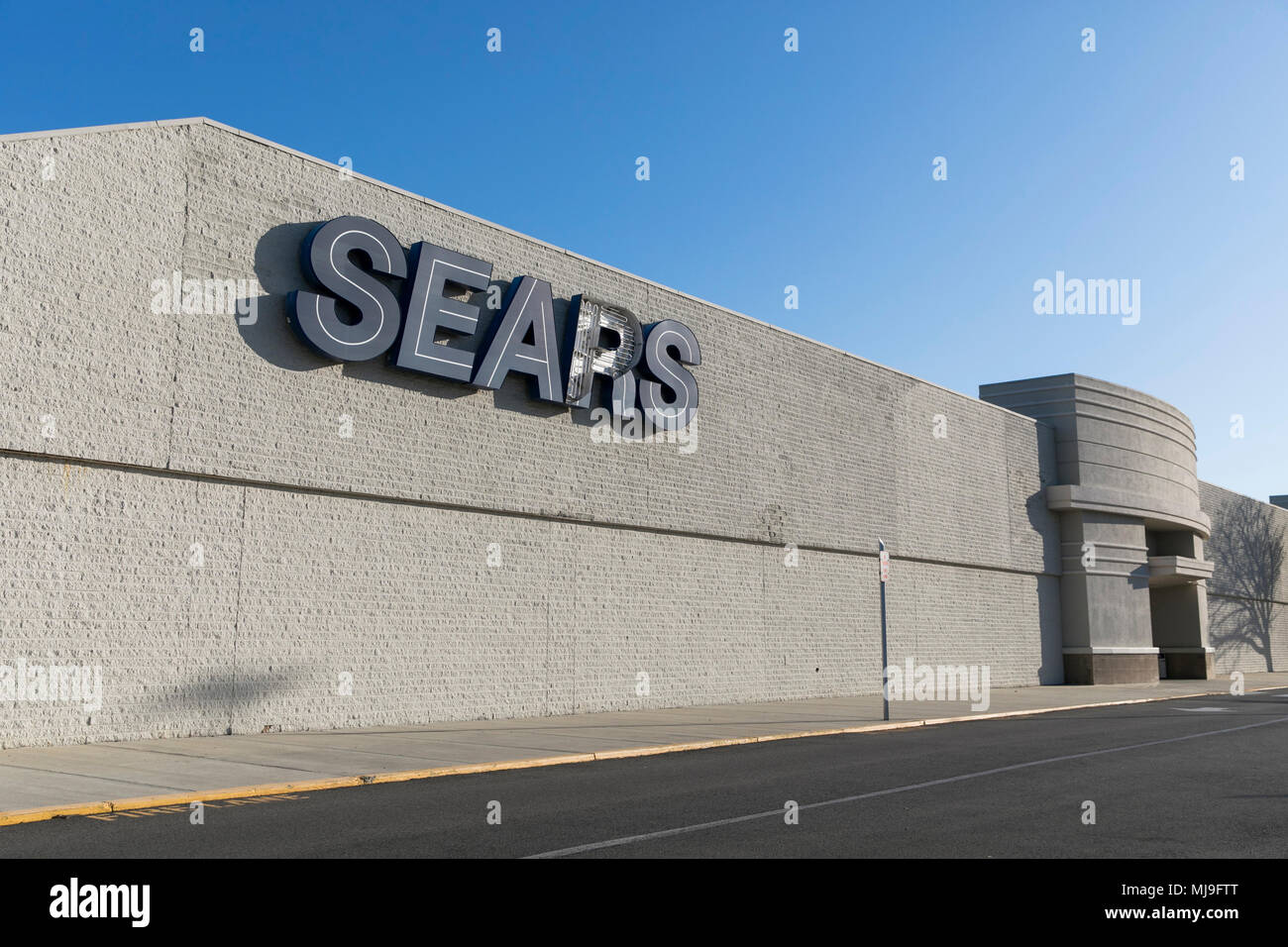 A logo sign outside of a Sears retail store in Annapolis, Maryland on ...