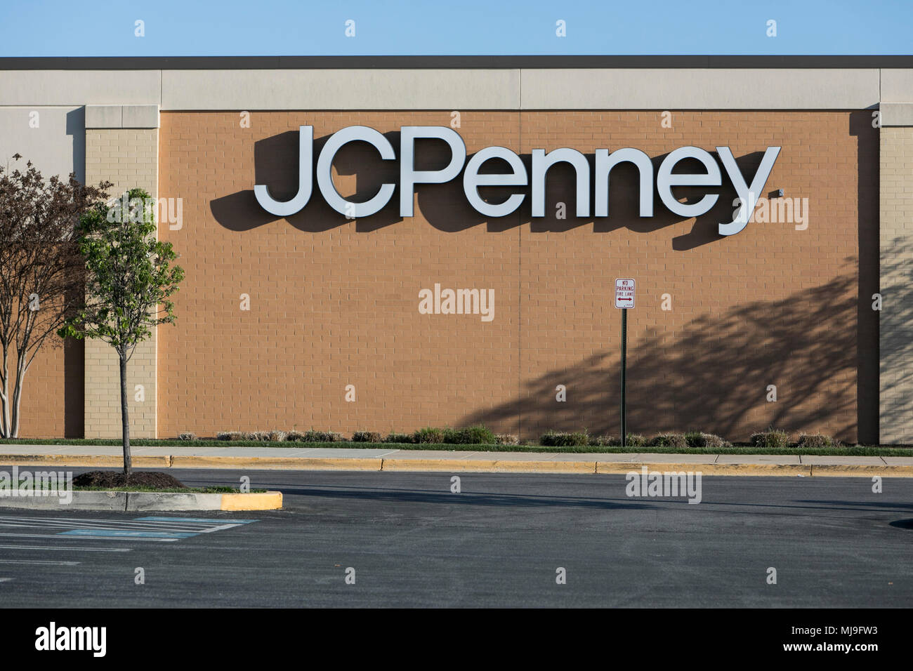 A logo sign outside of a JCPenney retail store in Annapolis, Maryland ...