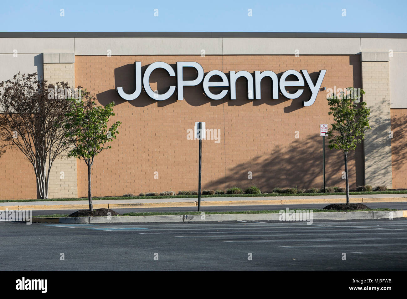 A logo sign outside of a JCPenney retail store in Annapolis, Maryland ...