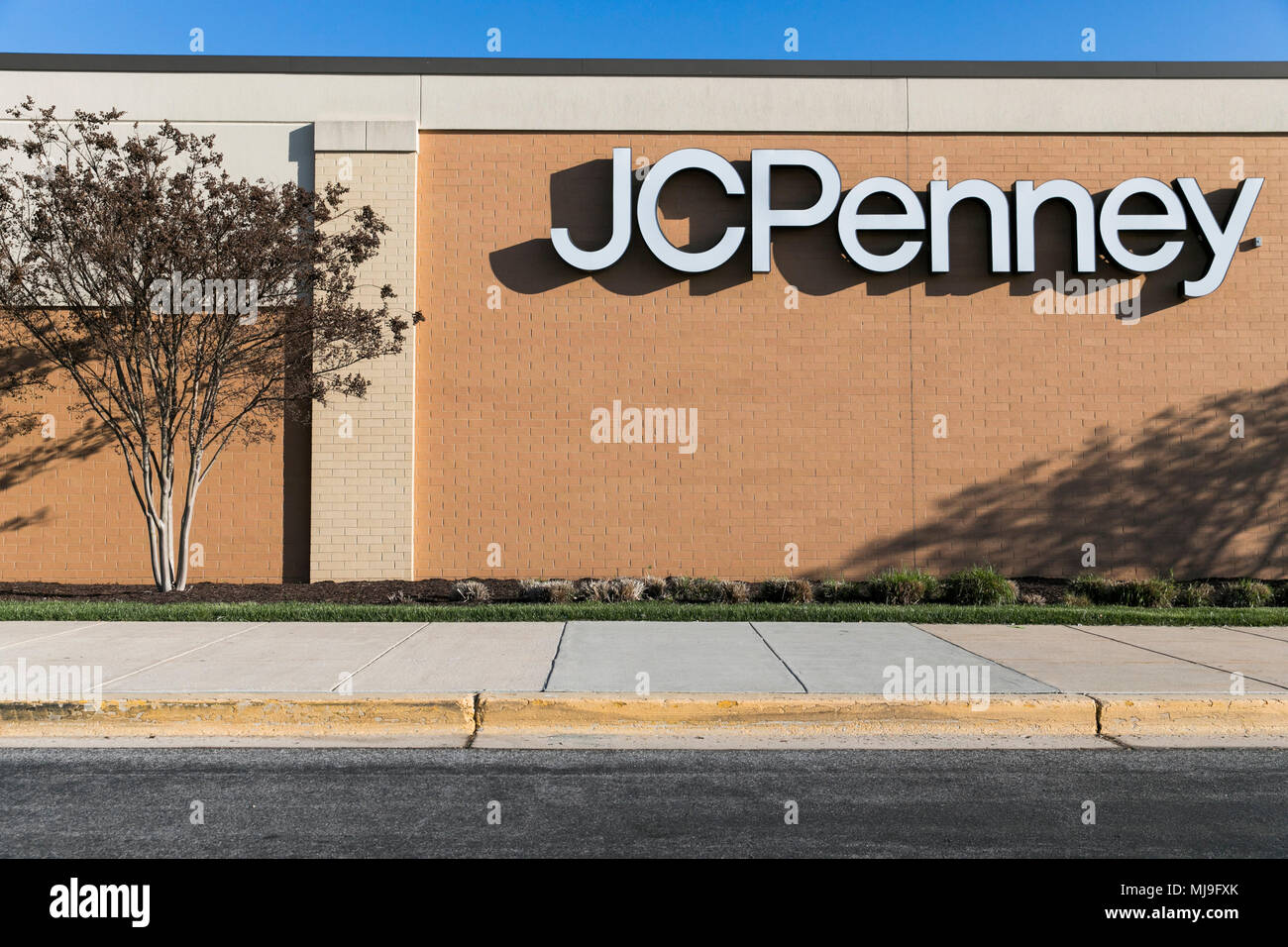 A logo sign outside of a JCPenney retail store in Annapolis, Maryland ...
