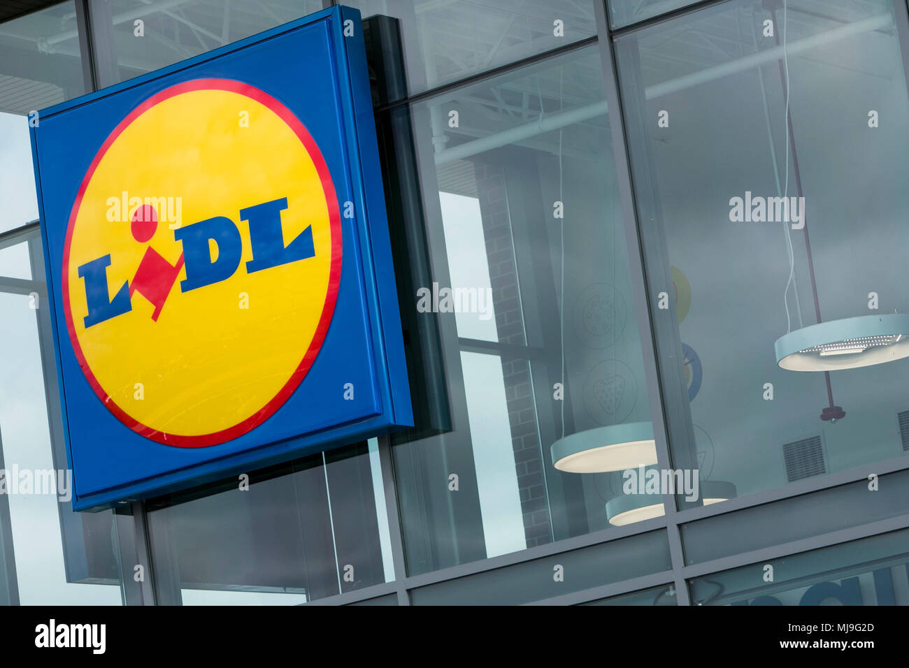 Lidl logo on the building of a lidl store hi-res stock photography and ...