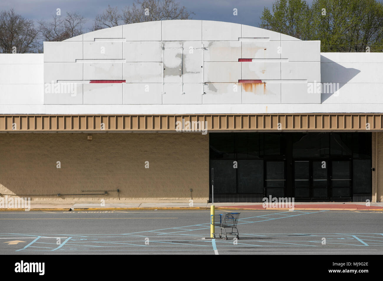 The outline of a logo sign at a now closed Big Kmart retail store in ...