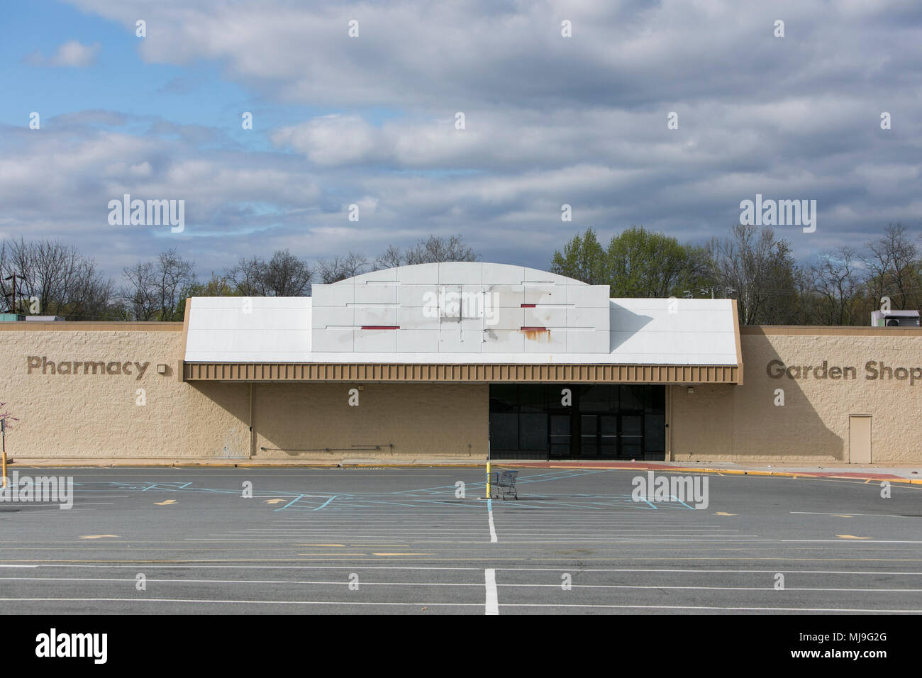 The outline of a logo sign at a now closed Big Kmart retail store in ...