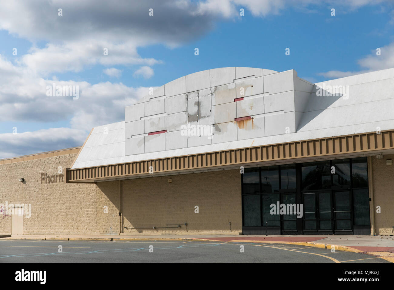 The outline of a logo sign at a now closed Big Kmart retail store in ...