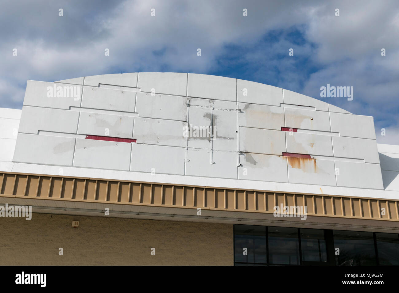 The outline of a logo sign at a now closed Big Kmart retail store in ...