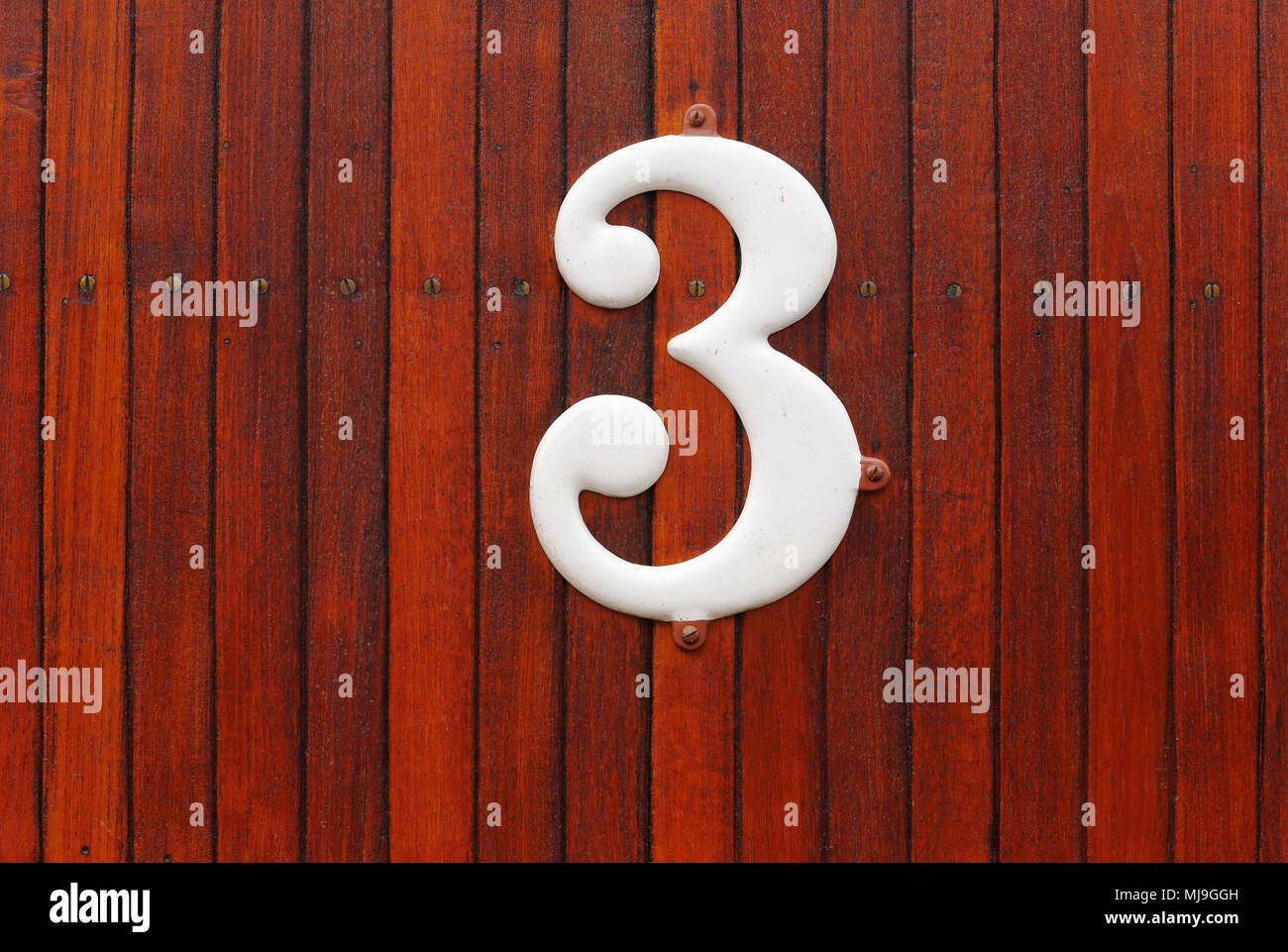 Number three on a vintage wood glad passenger coach indicates third ...