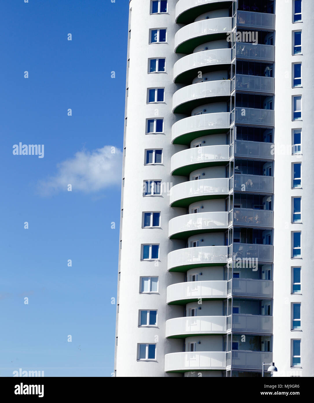 Tall modern Swedish apartment tower building Stock Photo - Alamy