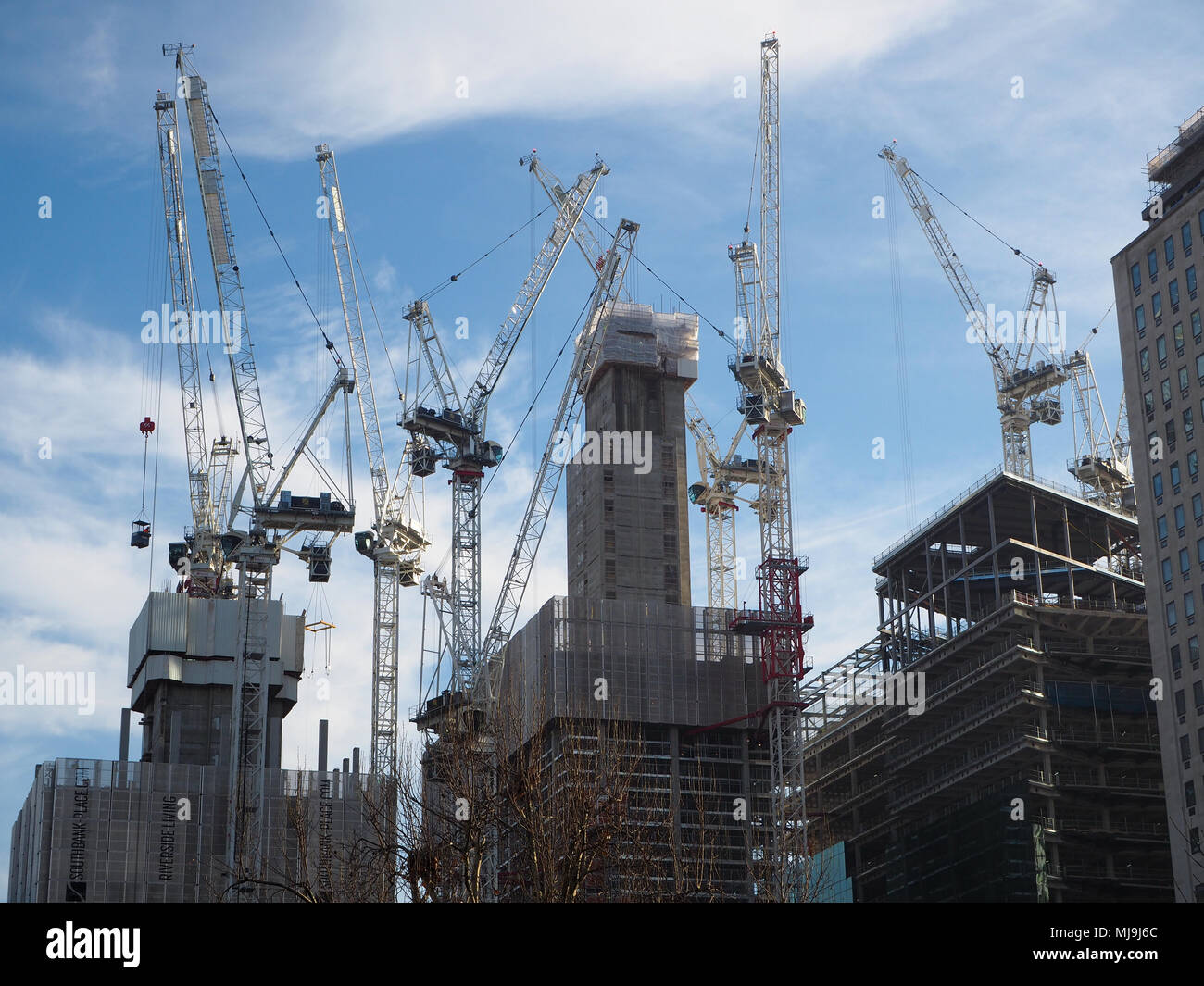 Construction site working cranes in hi-res stock photography and images ...
