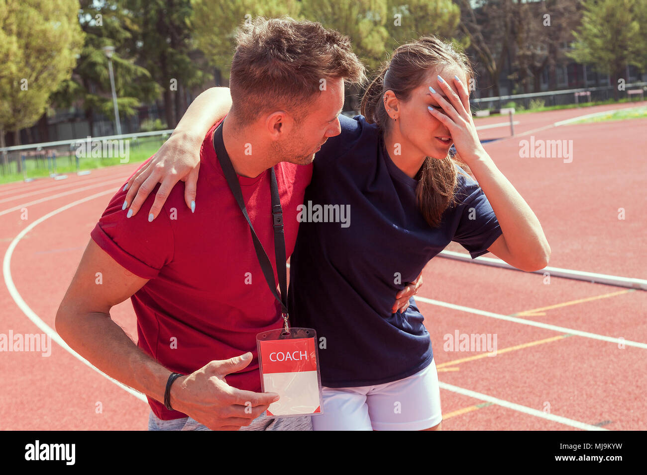 Injured athlete and coach hi-res stock photography and images - Alamy