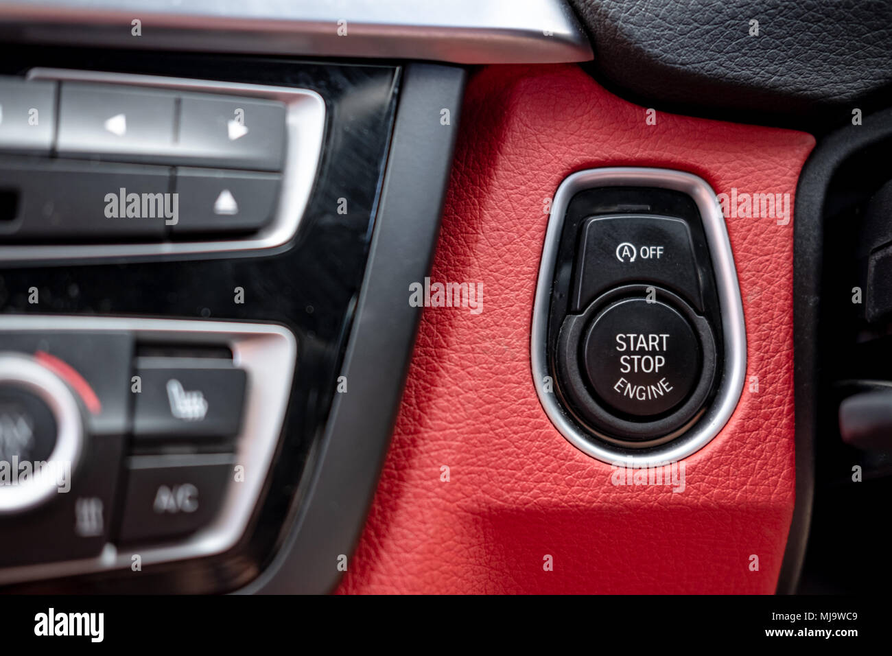 Close-up, isolated image of an engine Start Stop button seen on the ...