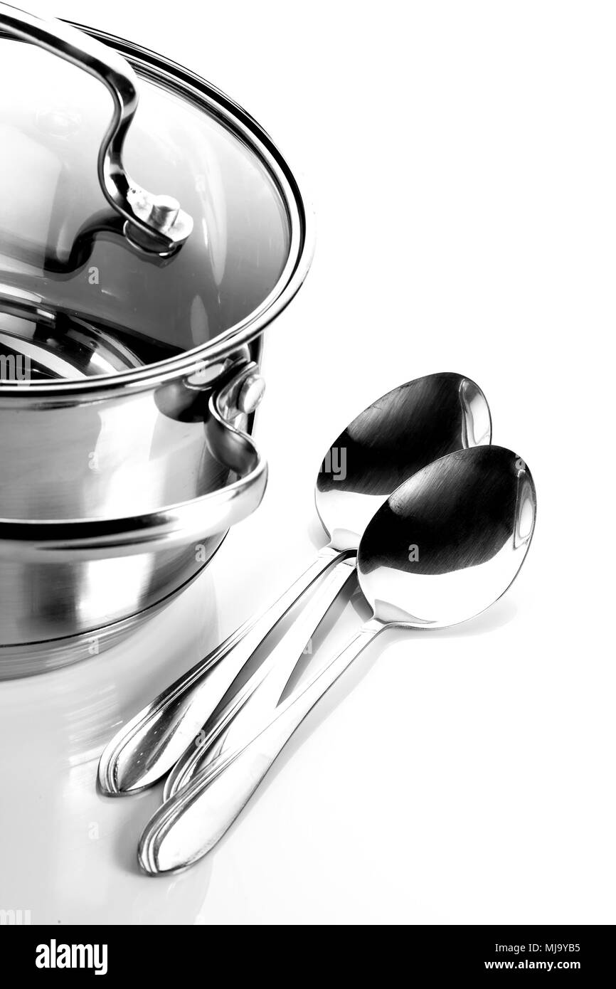 Pan and spoons. Kitchen utensils. Ware Stock Photo - Alamy