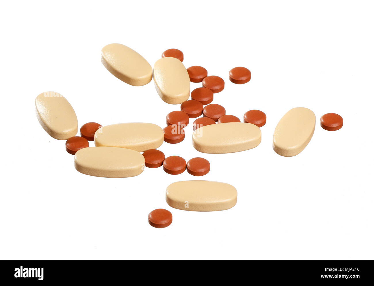 Two different kinds of medicines in tablet form, isolated on white ...