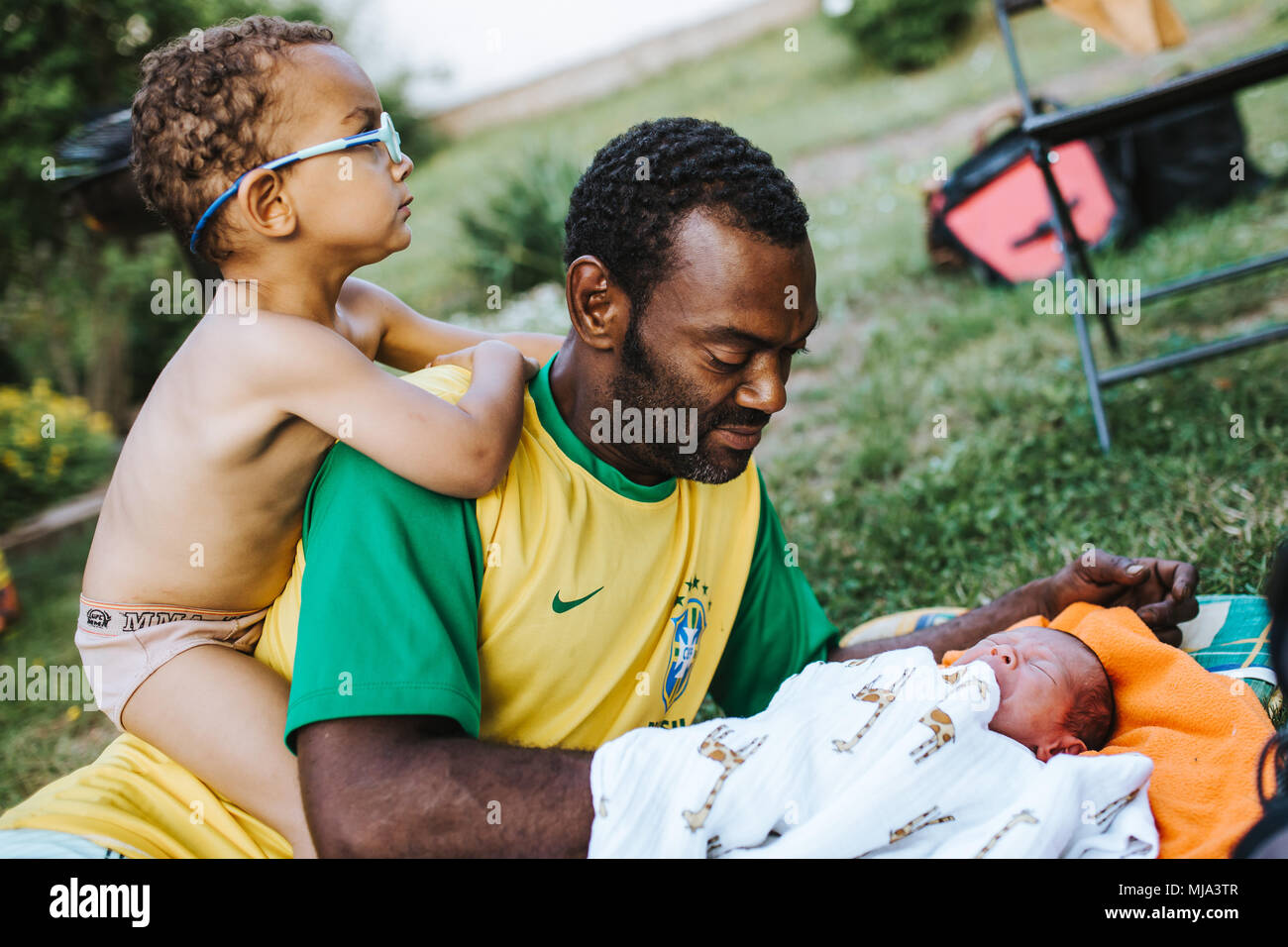 Lying on shoulder hi-res stock photography and images - Alamy