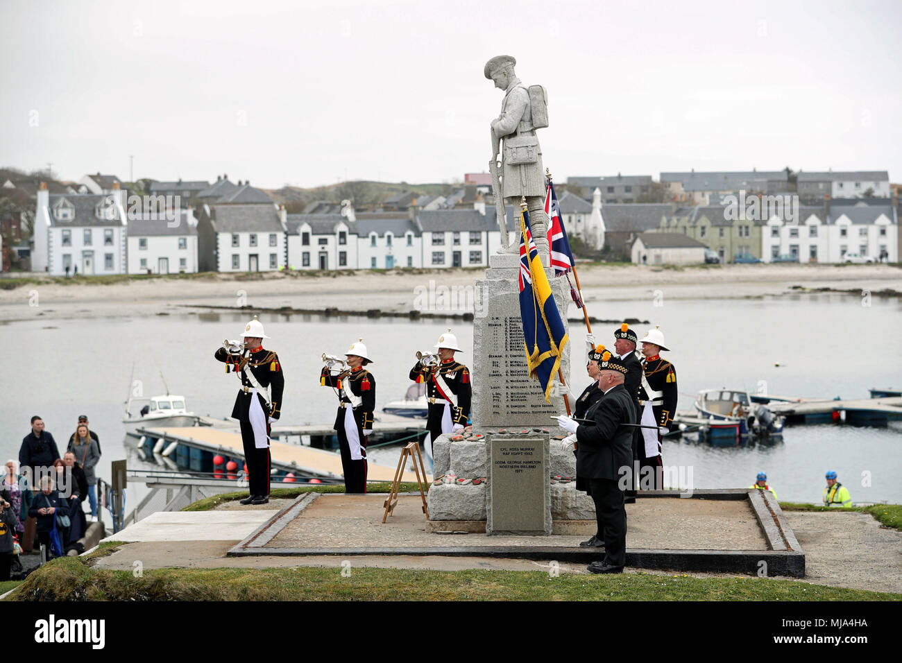 Bugler players from the Royal Marines during a commemoration service at ...