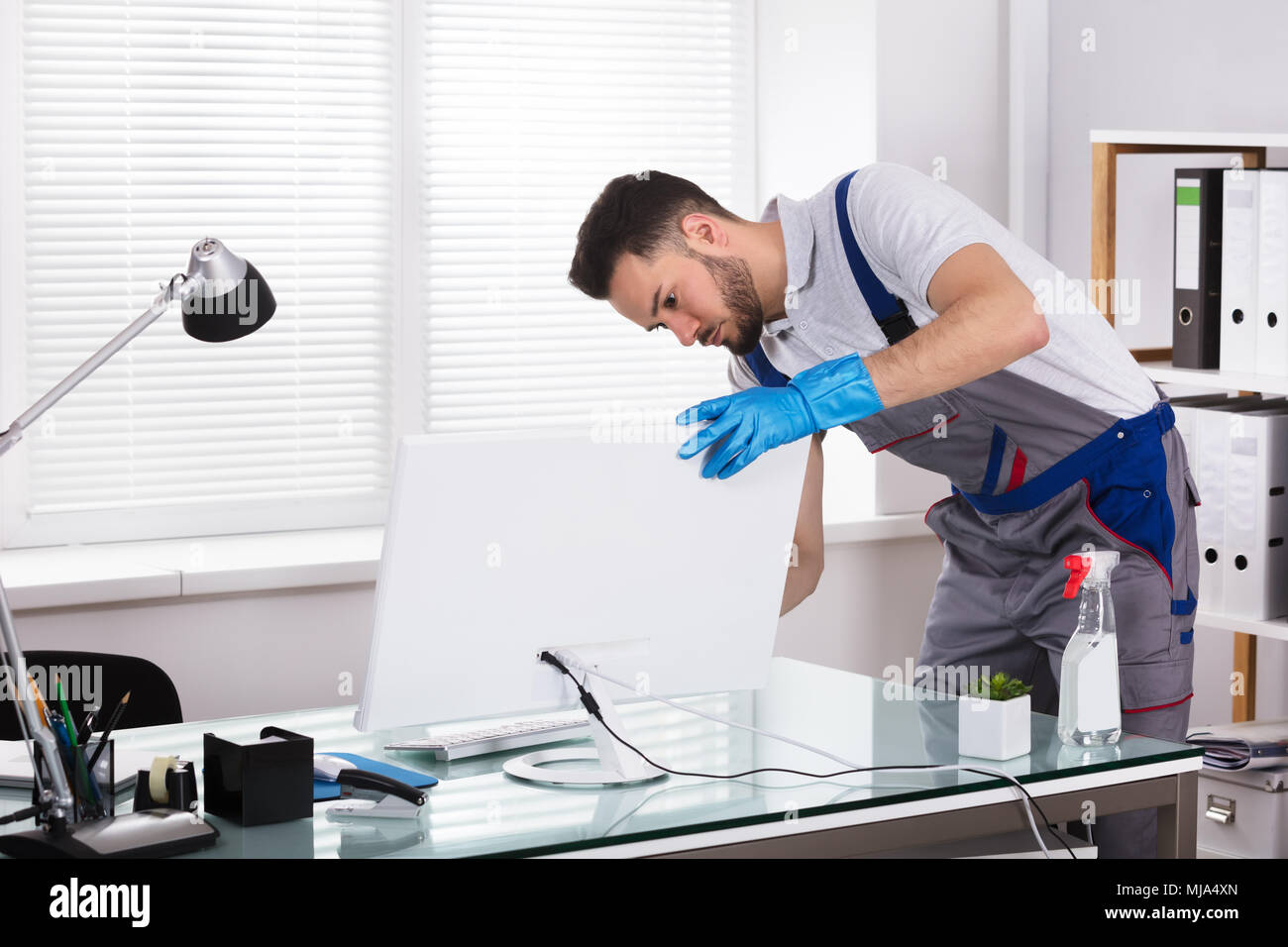 Man office standing up chair hi-res stock photography and images - Alamy