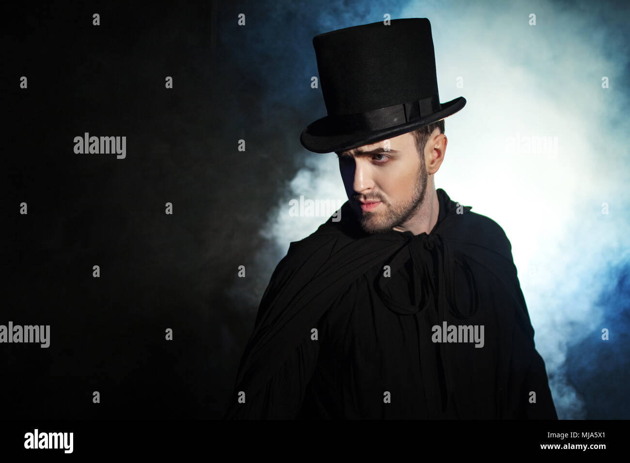 Black hat and cloak hi-res stock photography and images - Alamy
