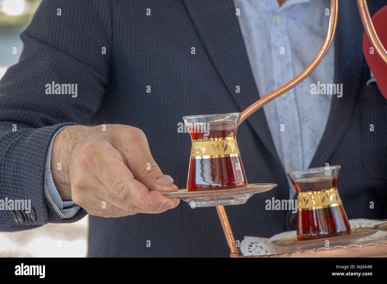 Turkish tea is served in traditional glass Stock Photo - Alamy