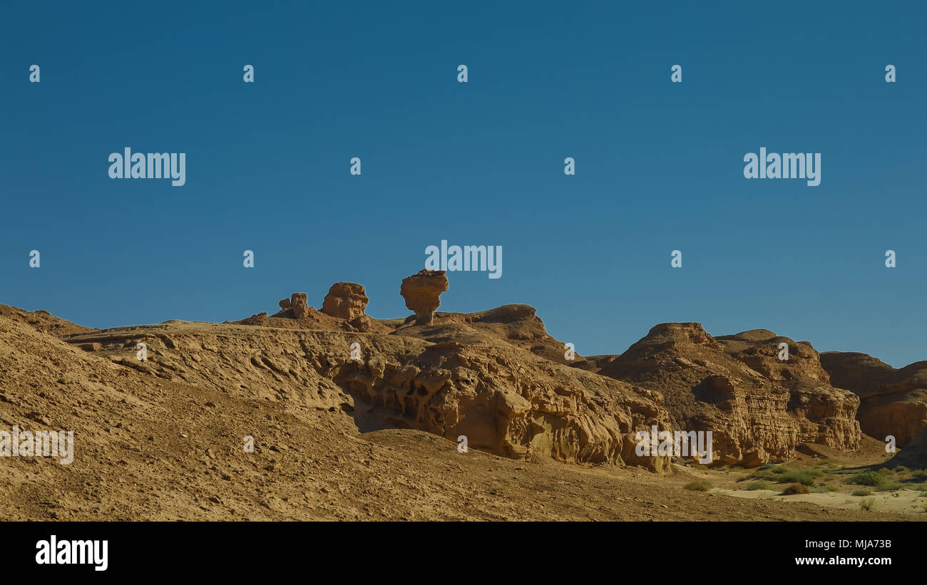 Buttes at the dried shore of Razazza lake aka Milh lake or Sea of Salt ...
