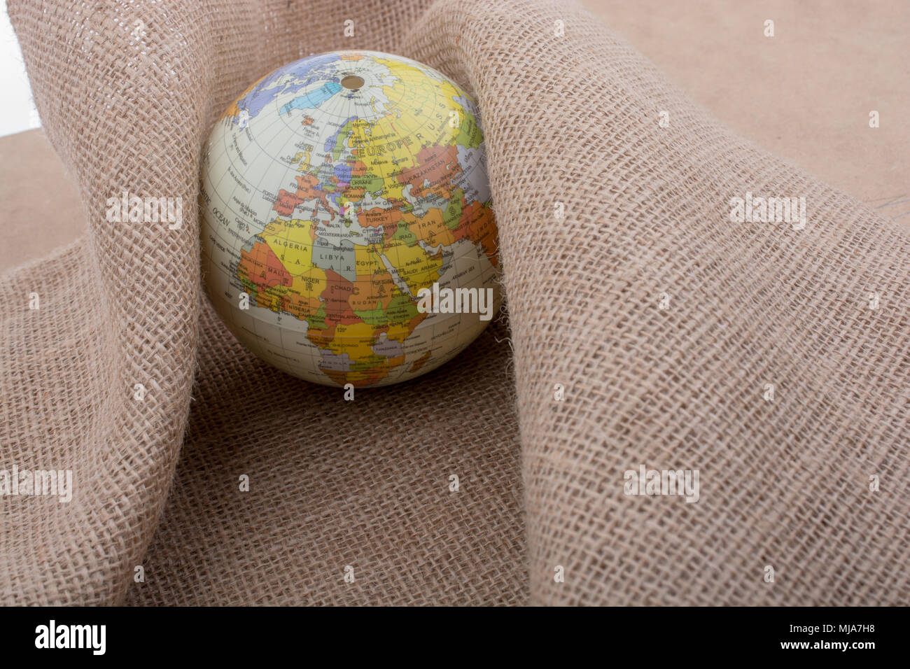 Globe is placed on canvas background Stock Photo - Alamy