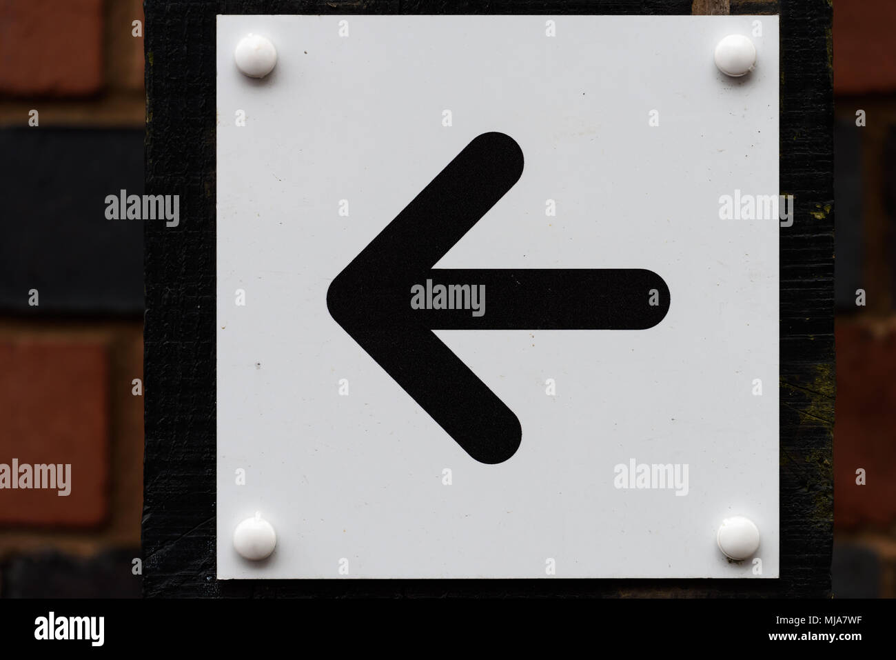 Sign with an Arrow Stock Photo - Alamy