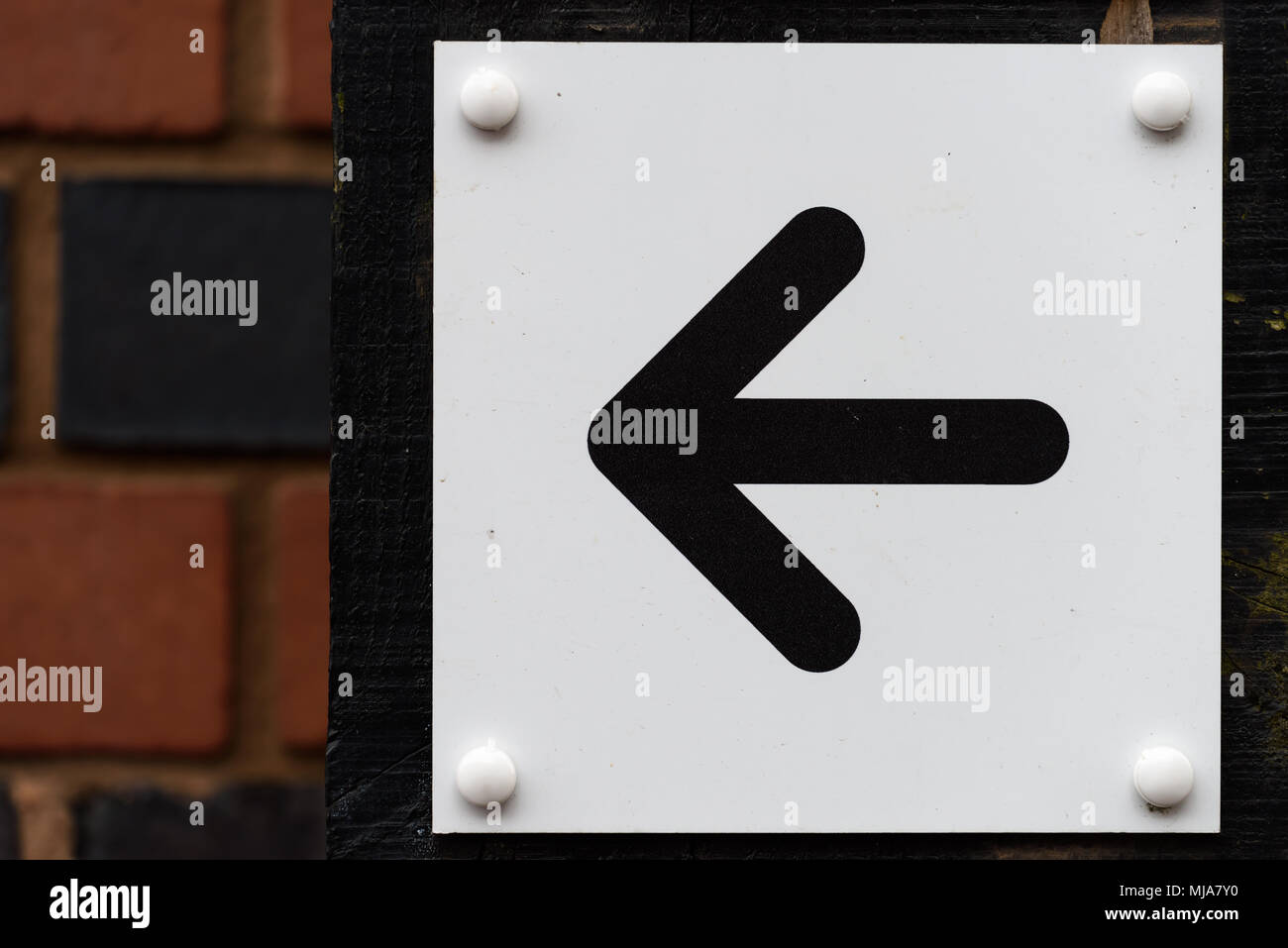 Sign with an Arrow Stock Photo - Alamy