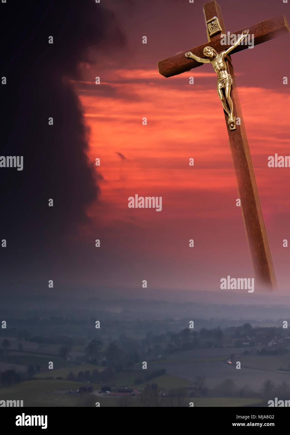Crucifix on the red sunset - dramatic view Stock Photo - Alamy