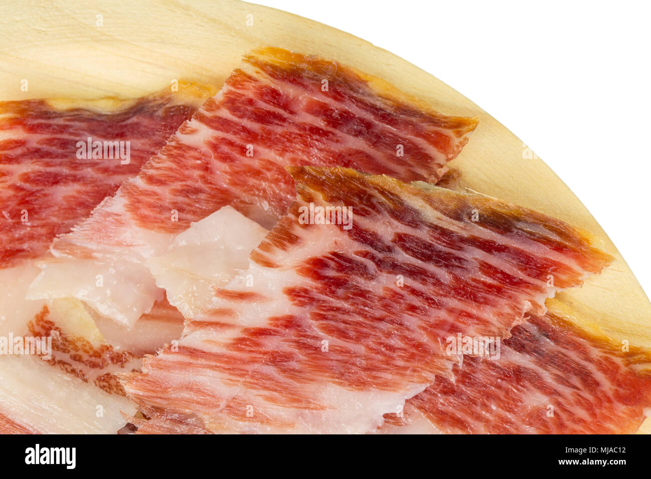 Top view of serrano ham slices over wood Stock Photo - Alamy