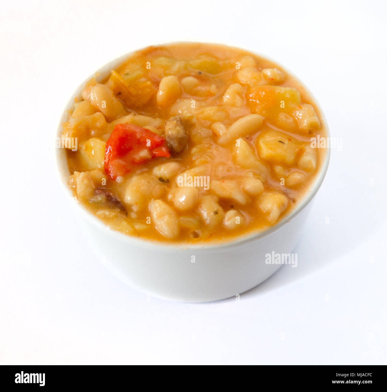 spanish typical cooked bean stew served with pepper Stock Photo - Alamy