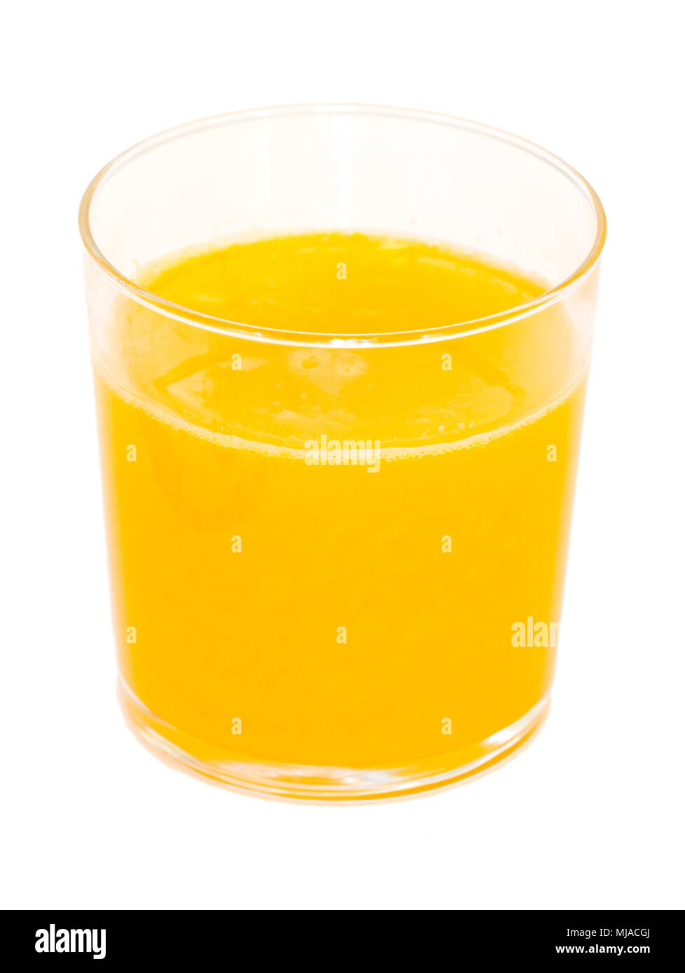 side view of orange juice glass on white background (close up Stock ...