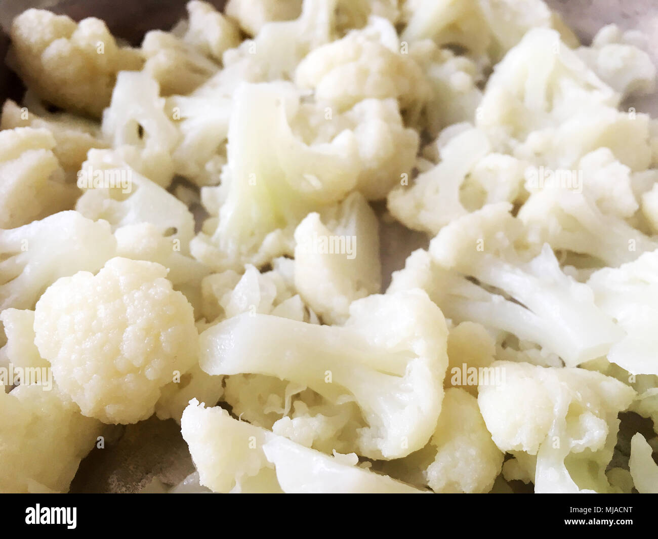 white broccoli cutted ready to cook at home in natural light Stock ...