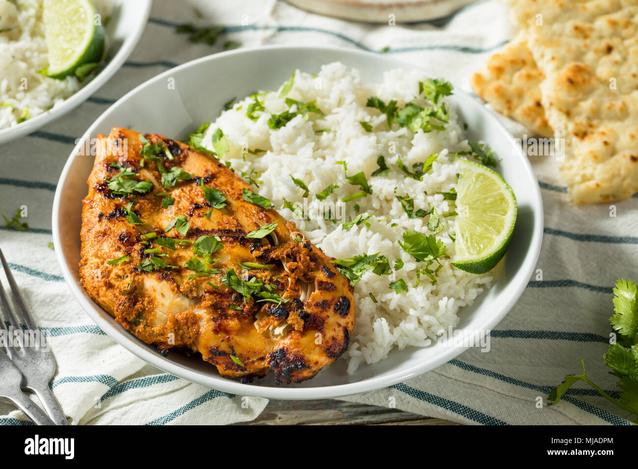Homemade Indian Tandoori Chicken with Rice and Naan Bread Stock Photo ...