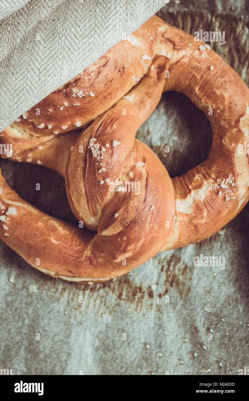 Fresh Pretzel From the Oven on Baking Sheet. Rustic Style Stock Photo ...