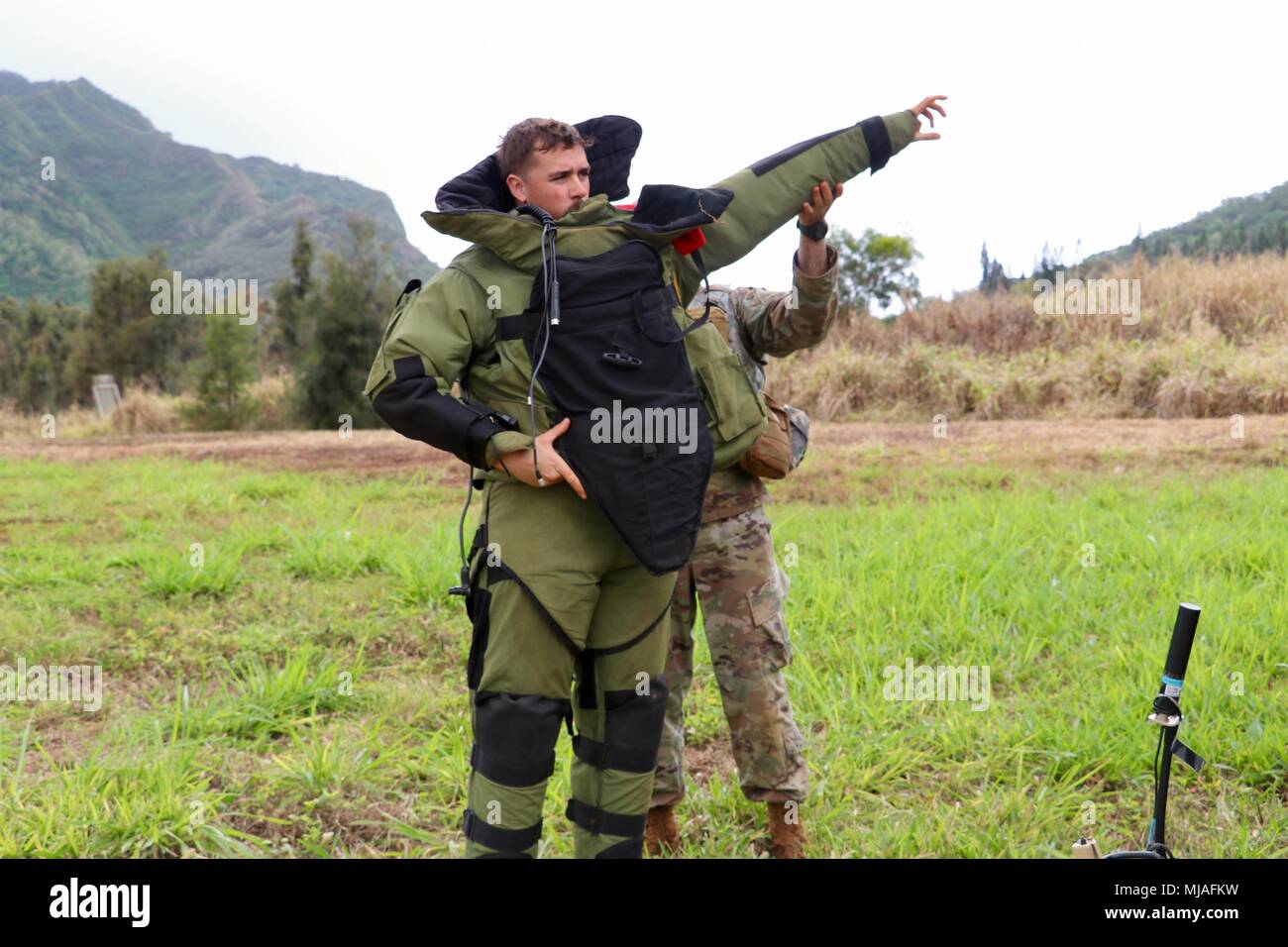 Staff Sgt. Edward (Eddie) Monczynski, assisted by Spc. Matthew Ruben ...