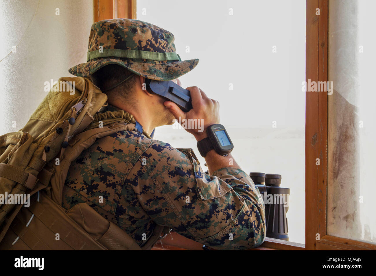 U.S. Marine Cpl German Perea Pineda, a forward observer with 4th Air ...