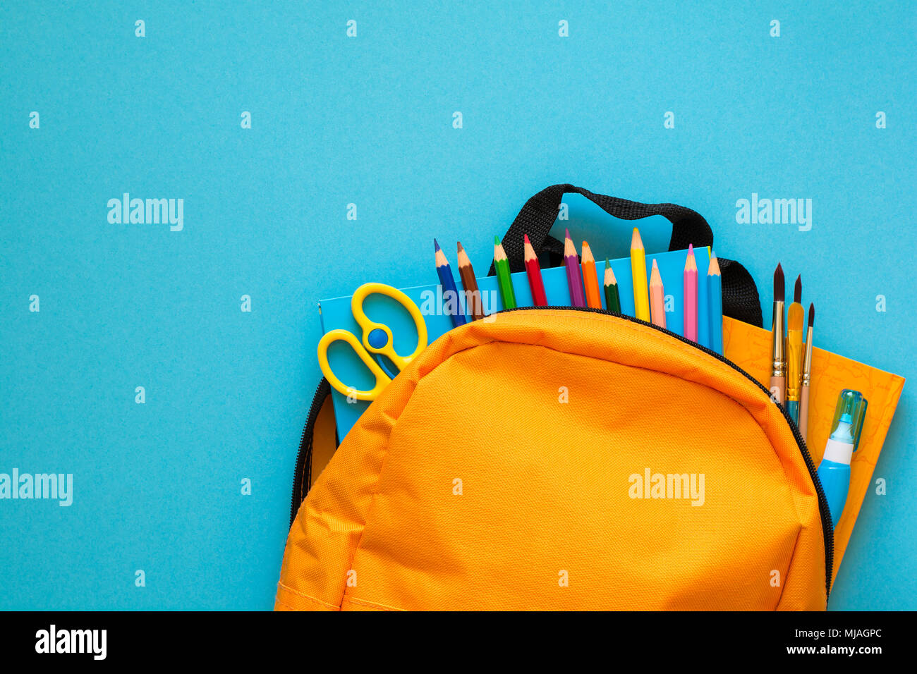 Back to school concept. Backpack with school supplies. Top view. Copy ...