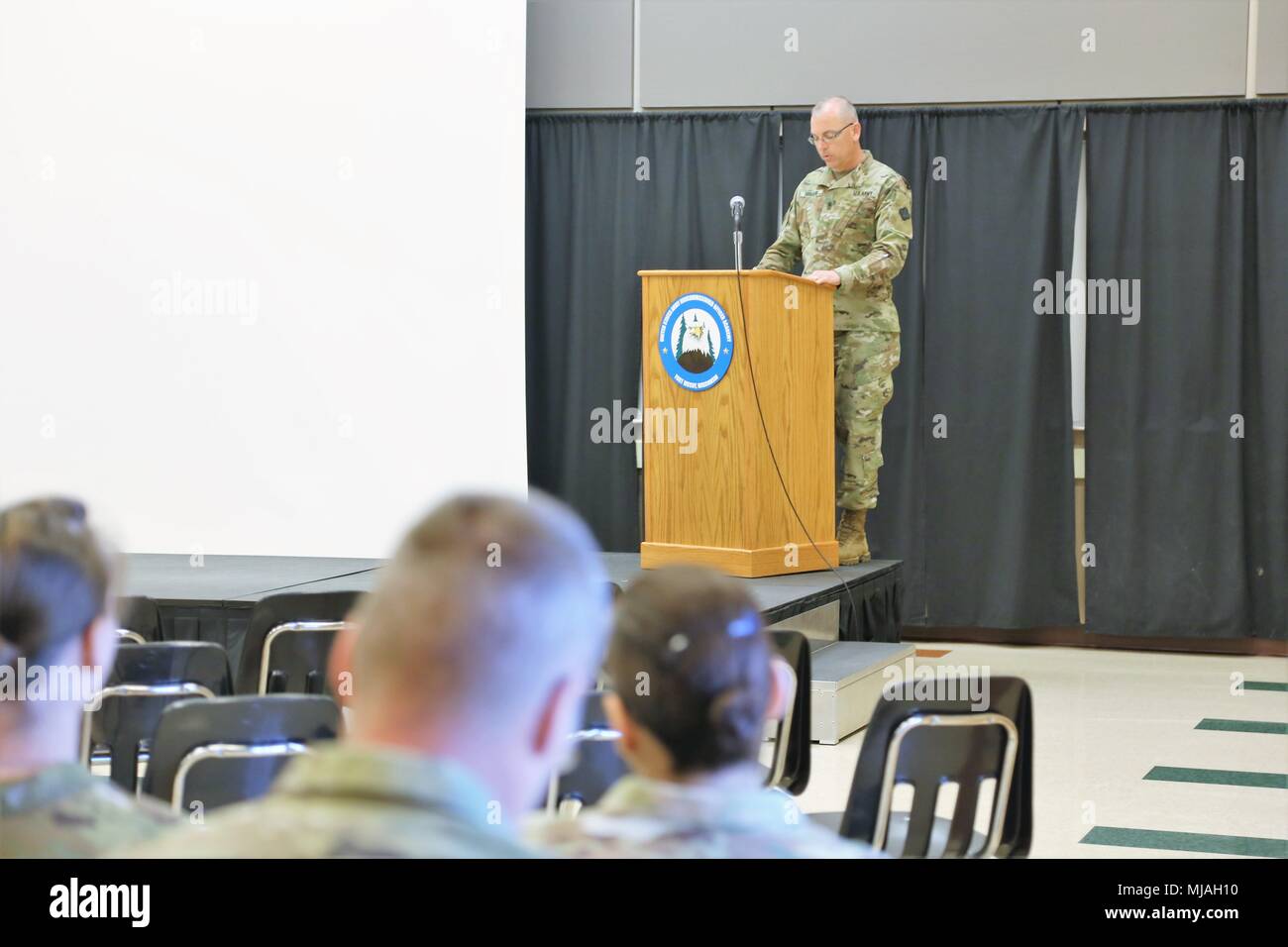 Sgt. Maj. Michael D. Sprague with the 88th Readiness Division gives his ...