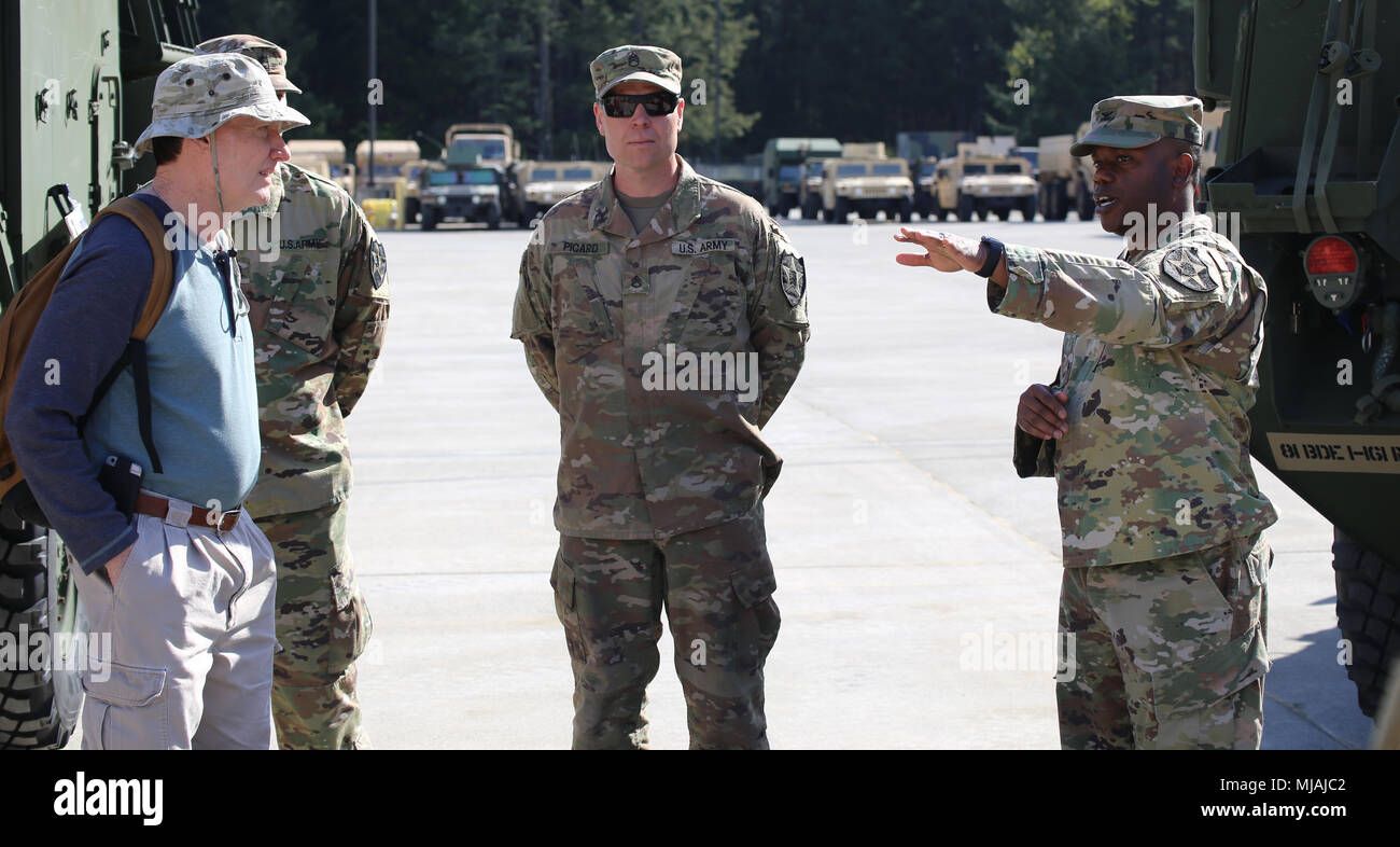 Col. Shaun Hodge, commander, 81st Stryker Brigade Combat Team, address ...