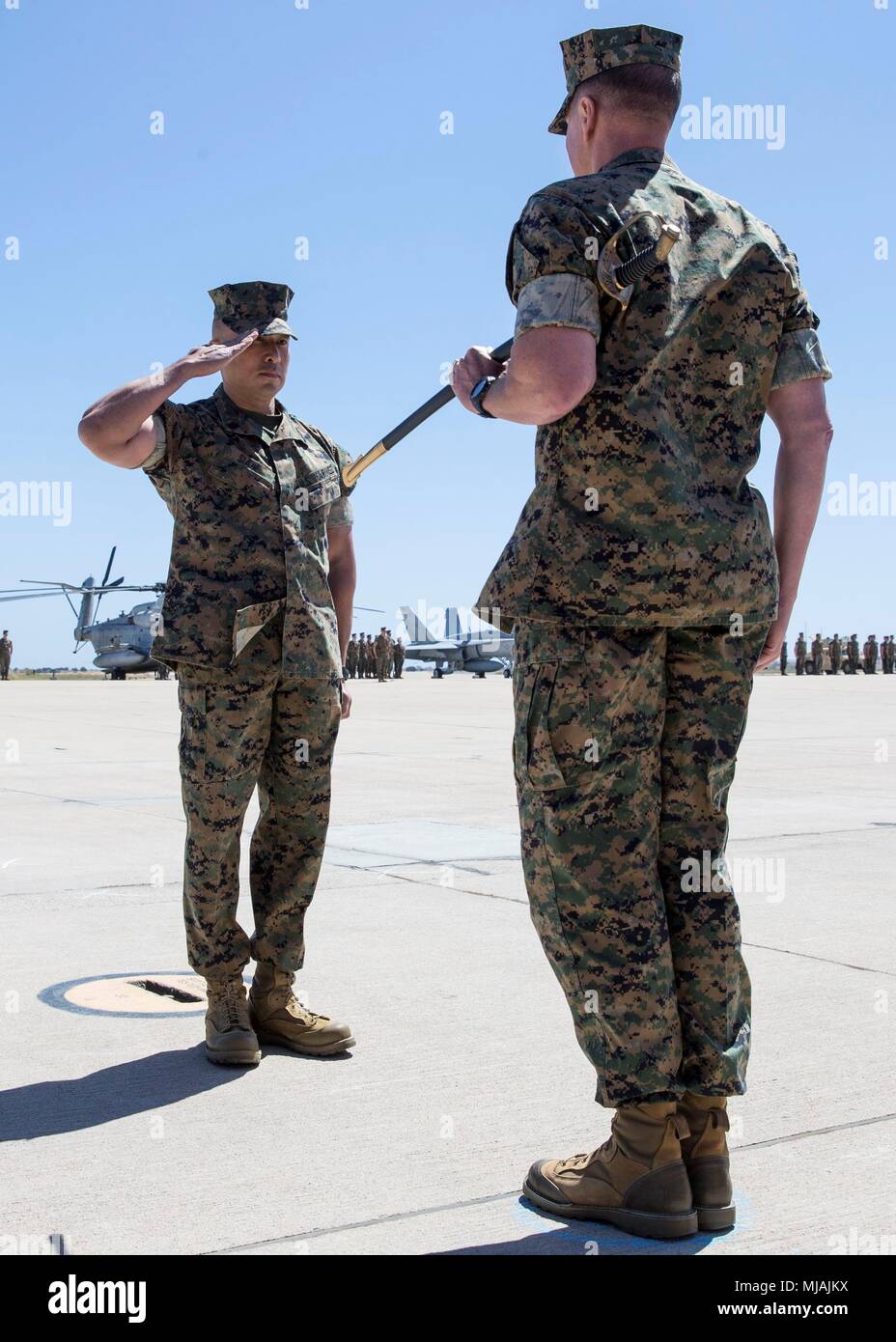 Sgt. Maj. Peter A. Siaw, left, assumes his post as the 3rd Marine ...
