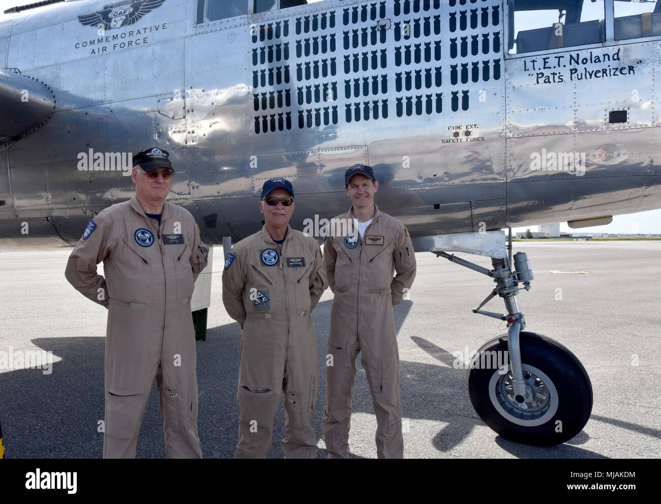 Dean Butler, left, copilot, Roger Van Ranst, center, flight Mechanic ...