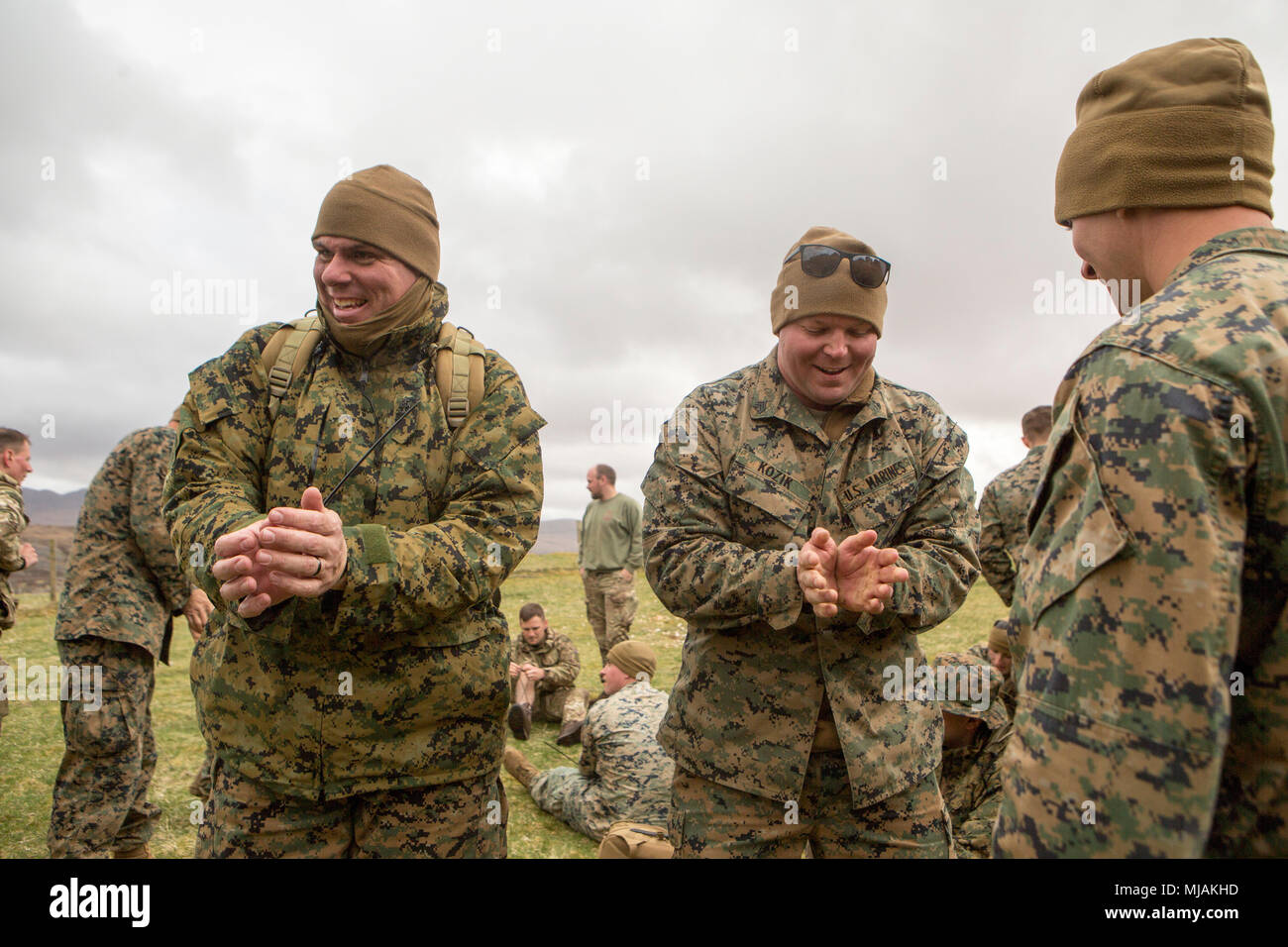 U.S. Navy Chief Petty Officer Rafael Corrada (left), corpsman with 4th ...